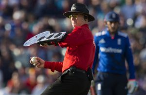 What is the Cricket Umpire Shield on Their Arm?